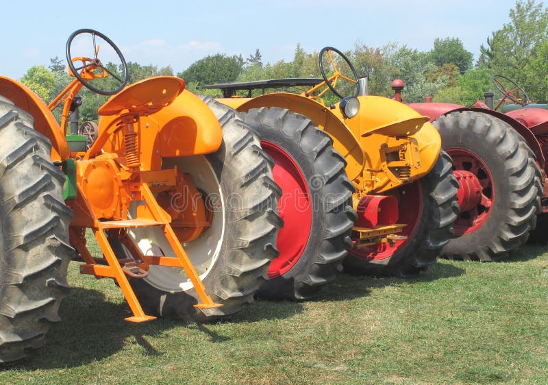 Three Farm Tractors from a Rear View Stock Photo - Image of vintage ...