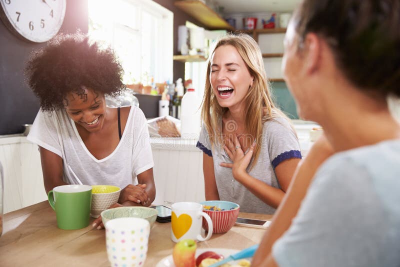 Three Female Friends Enjoying Breakfast at Home Together Stock Image ...