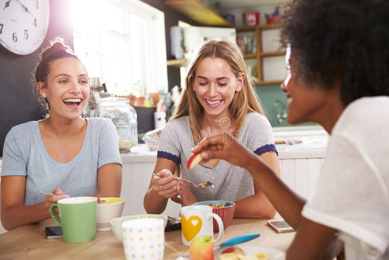 Three Female Friends Enjoying Breakfast at Home Together Stock Image ...