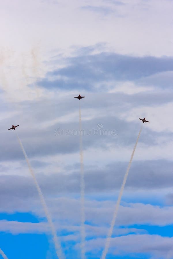 Three Fighter Jets are Flying in Formation in the Sky Stock Image ...