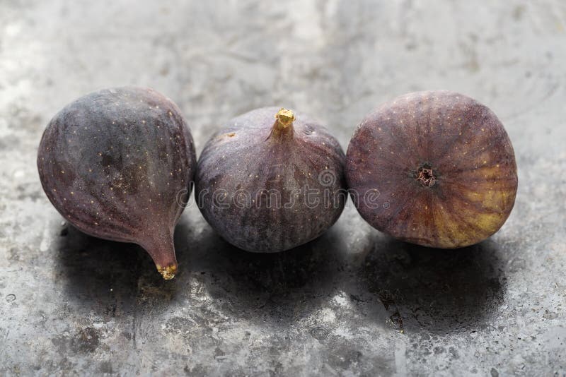 Three figs on the table stock photo. Image of diet, nature - 157285352