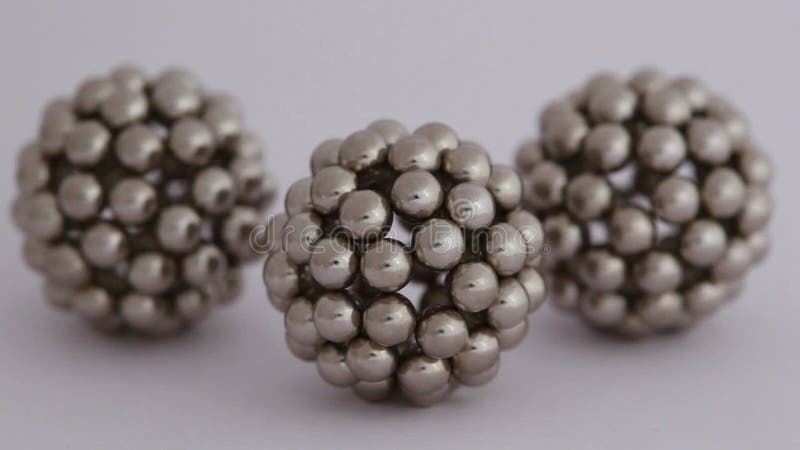 Three Figures Consisting of Metallic Balls are Stock Footage - Video of ...