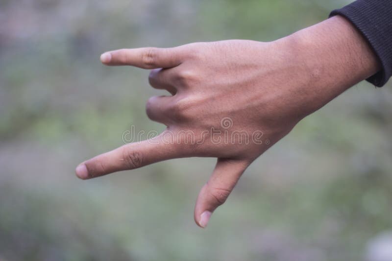 Three Fingers in One Hand are Open and the Rest are Wrapped Stock Image ...