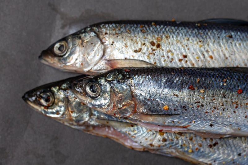 Three Fish Close-up. Marinated Fish in Spice Stock Photo - Image of ...