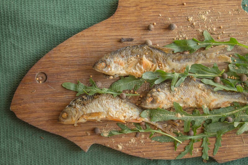 Three fish stock image. Image of bones, nibbled, ruccola - 72071217