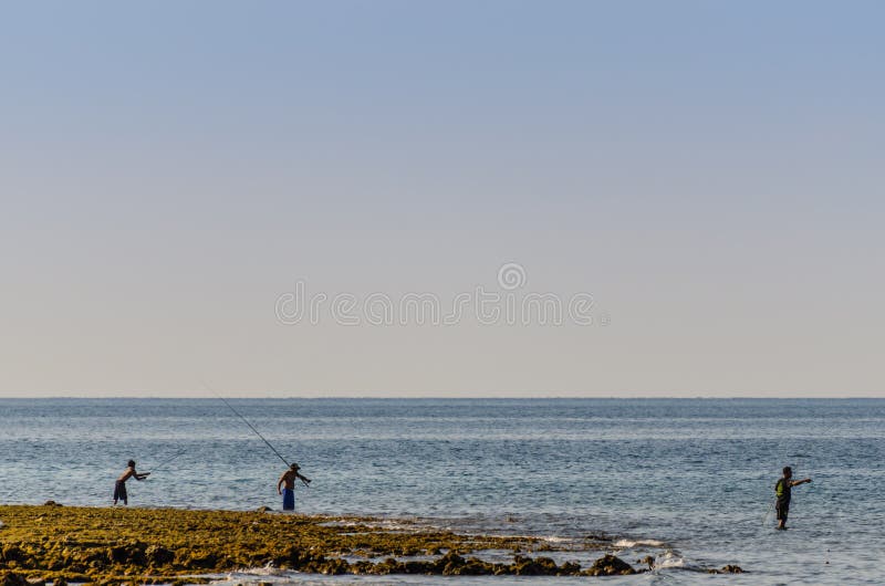 Three Fishermen at the Beach at the Sea Stock Image - Image of tourism ...