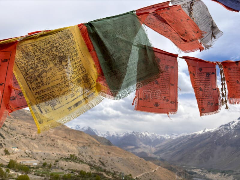 Three Flags Hanging from a Rope, One of Which is Torn Stock Photo ...