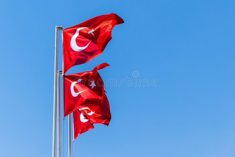 Three Flags Against a Blue Sky. Stock Photo - Image of cape ...