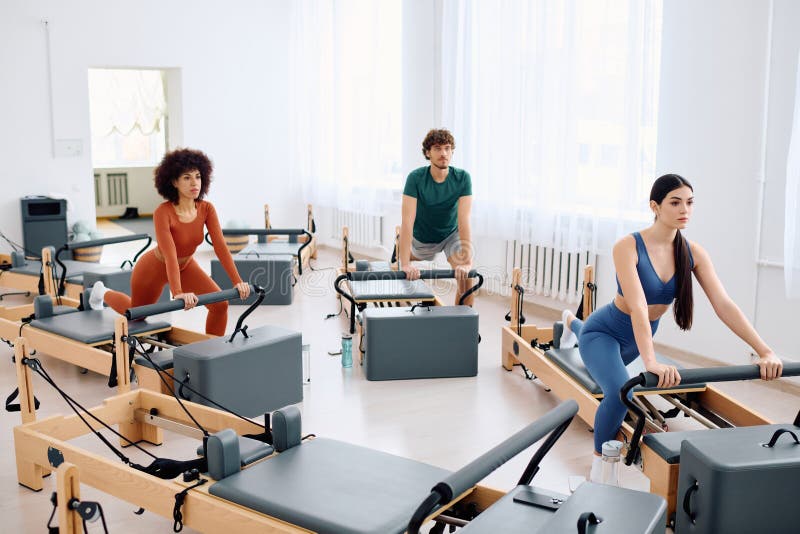 Engaging Pilates Session at a Modern Stock Photo - Image of exercise ...