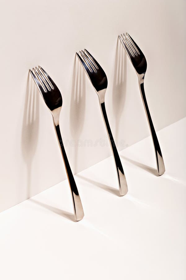 Three Forks Casting Artistic Shadows Stock Image - Image of monochrome ...