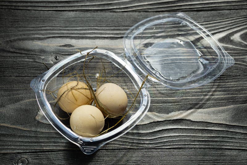 Three Fresh Eggs on a Wooden Table Packed for Fast Delivery Stock Image ...