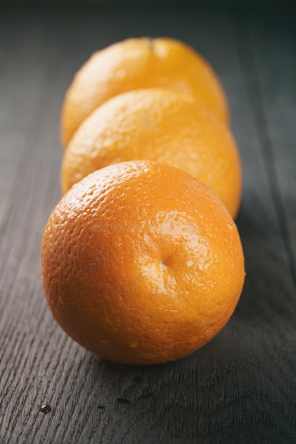 Three Fresh Ripe Oranges on Oak Wooden Table Stock Image - Image of ...