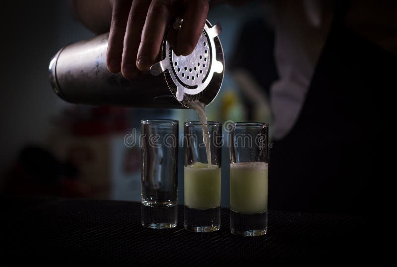 Three Freshly Prepared Shots in a Club Stock Image - Image of liquid ...