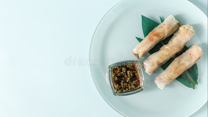 Three Fresh Spring Rolls Stuffed with Seafood and Vegetables on a Light ...