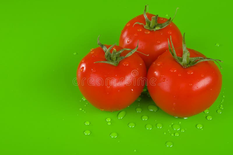 Three fresh tomatoes stock image. Image of drop, vegetables - 5626283