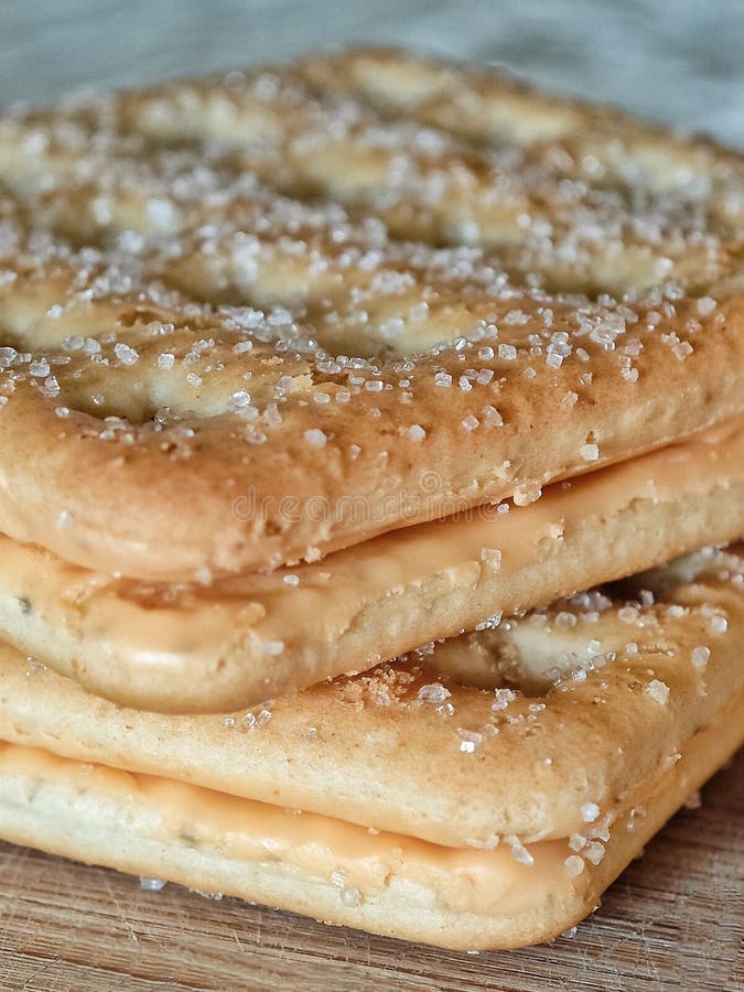 Freshly-baked Biscuits, Glazed with Sugar, on a Rustic Wooden Table ...