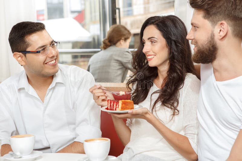 Three friends in cafe stock photo. Image of smile, smiling - 61016008