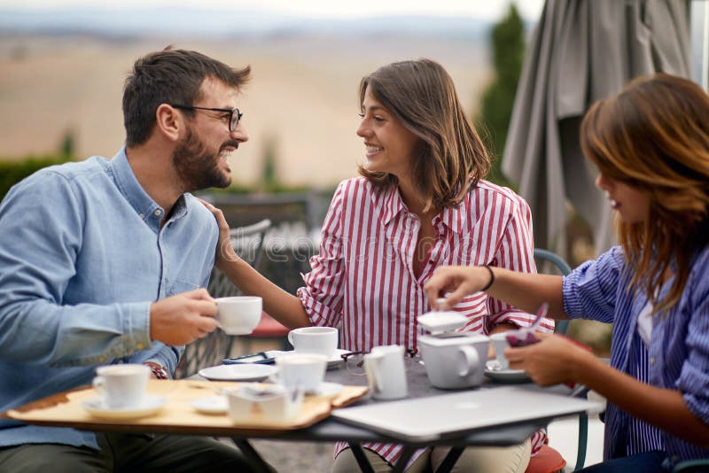 Three Friends Drinking Coffee Together Stock Photo - Image of happy ...
