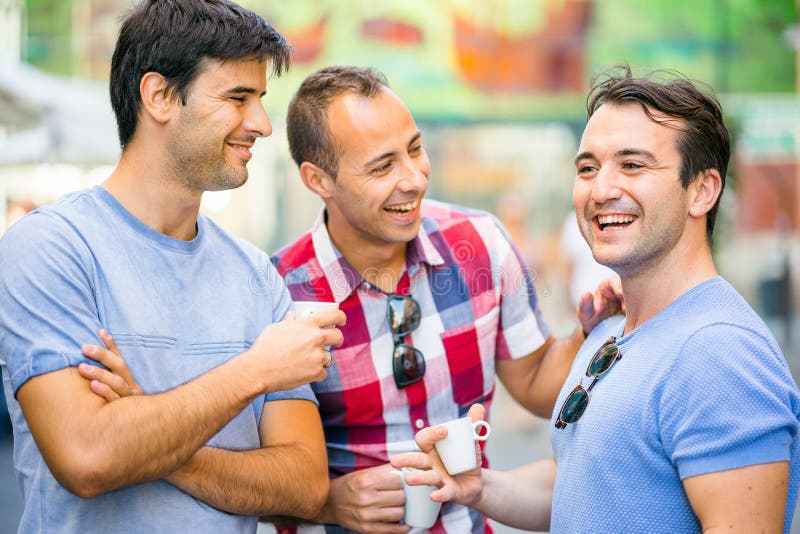 Three Friends Having Fun while Drinking Coffee Outdoor Stock Image ...