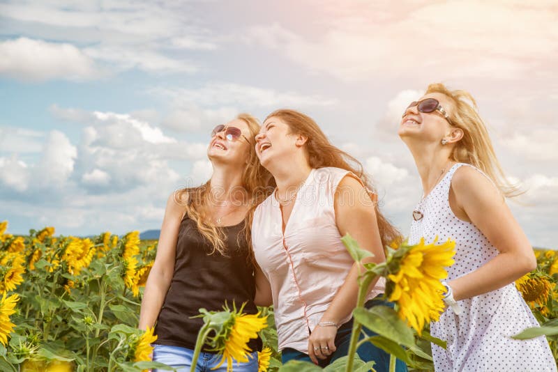 Three Friends Having a Good Time Outdoors Stock Photo - Image of casual ...