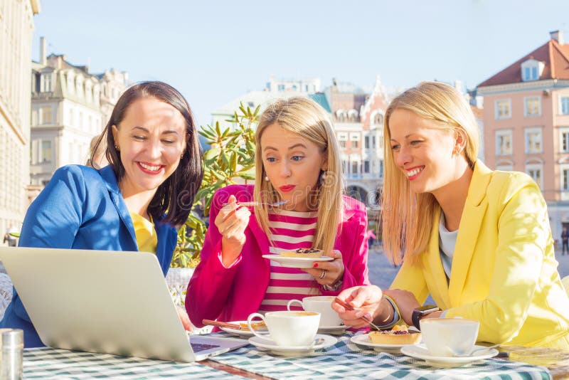 Three Friends Looking at Computer Stock Image - Image of colorful ...