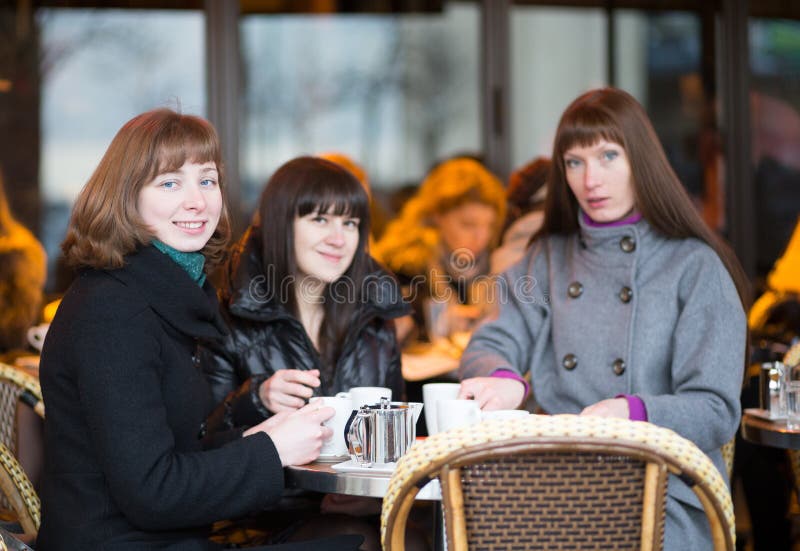 Friends in a Parisian Street Cafe Stock Image - Image of coffee, city ...