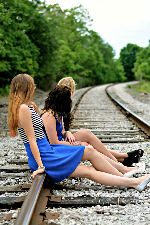 Three Friends Waiting for the Train Stock Image - Image of waiting ...