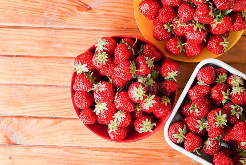 Three Full Bowl Strawberries on a Table Top View Stock Image - Image of ...