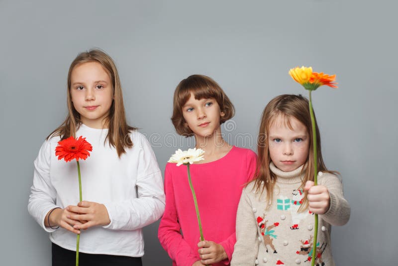 Three Funny Children with Flowers, Portrait Stock Image - Image of ...