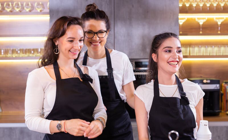 Three Funny Female Chef in Uniform Having Fun in the Kitchen Stock ...