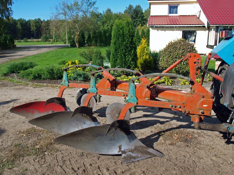 Three furrow plow stock image. Image of coulters, tractor - 34501537