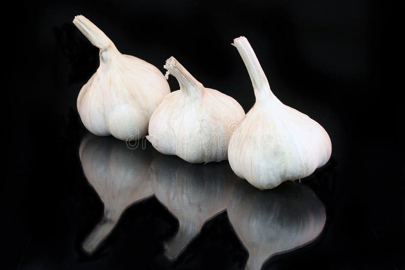 Three garlic stock photo. Image of smell, black, dinner - 7317978