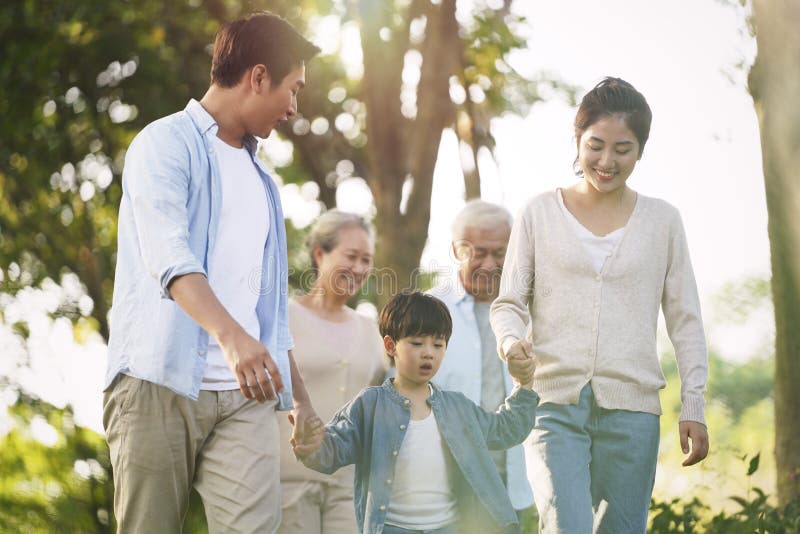Three Generation Asian Family Walking in Park Stock Image - Image of ...