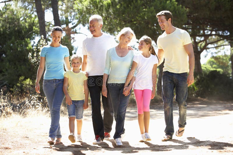 Three Generation Family on Summer Countryside Walk Together Stock Photo ...