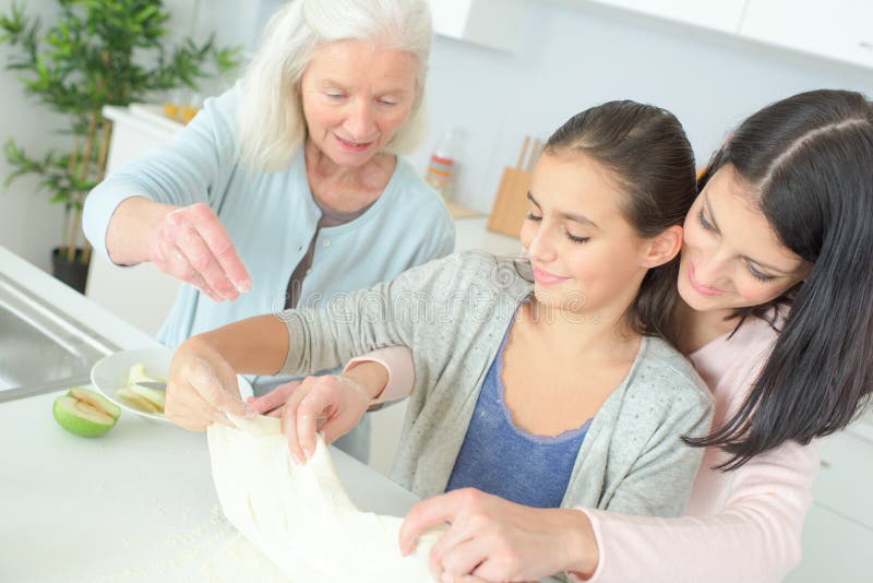 Three Generations Cooking Together Stock Photo - Image of tart, advice ...