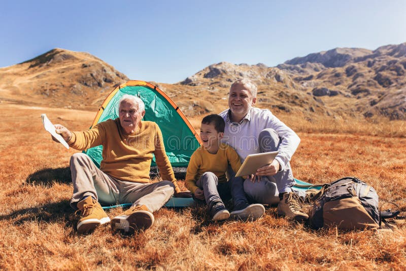 Three Generations of Family Camping Together in the Autumn Stock Image ...