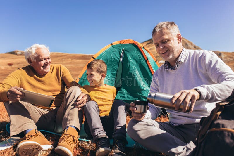 Three Generations of Family Camping Together in the Autumn Stock Image ...