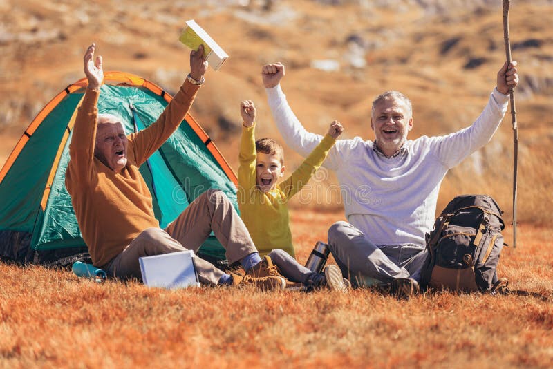 Three Generations of Family Camping Together in the Autumn Stock Photo ...