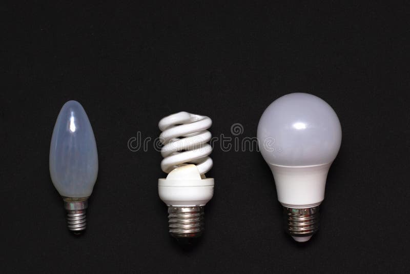 Three Generations of Light Bulbs on a Black Background: Ordinary Light ...