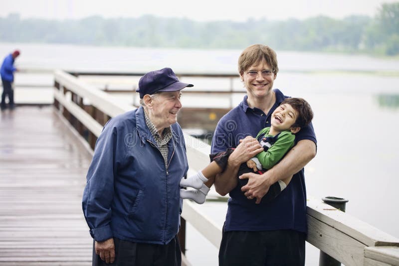 Three generations together stock image. Image of blue - 14776955