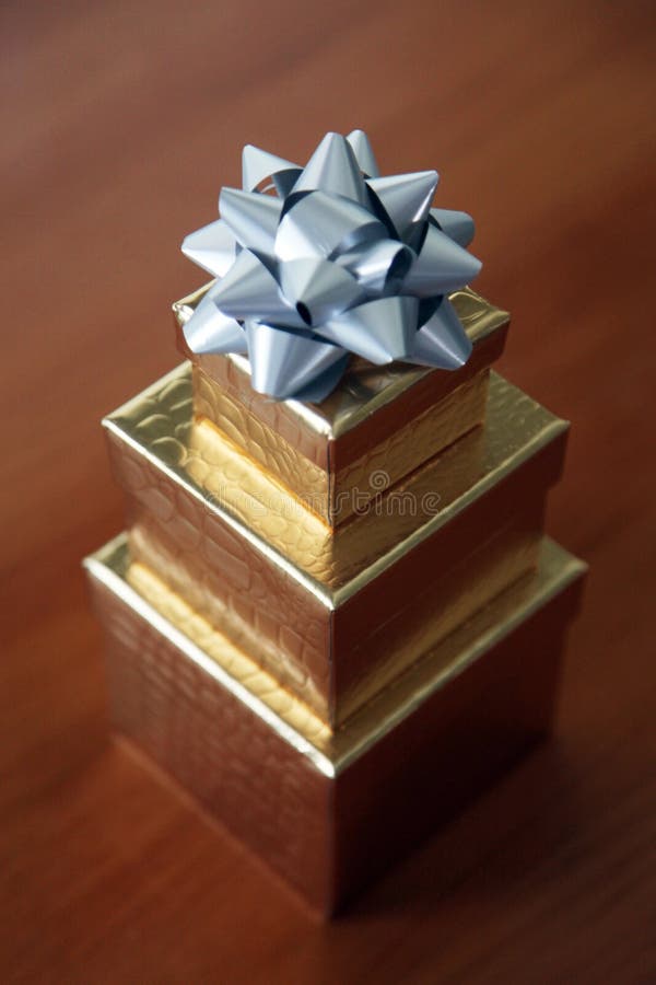Three Gift Boxes with Satin Bows and White Pine Cones Stock Image ...