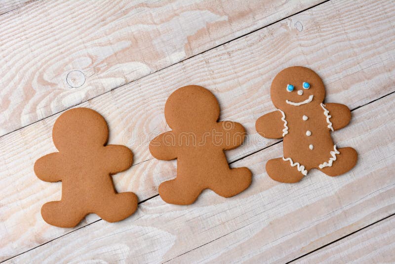 Three Gingerbread Cookies One Decorated Stock Image - Image of holidays ...