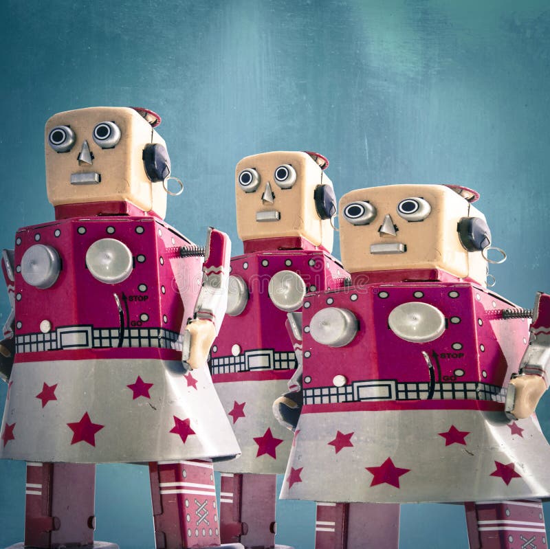 Three Girl Robot Toys Looking Forward, Stock Photo - Image of freedom ...
