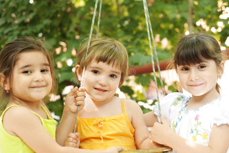 Three girls stock photo. Image of girls, pretty, green - 10133890