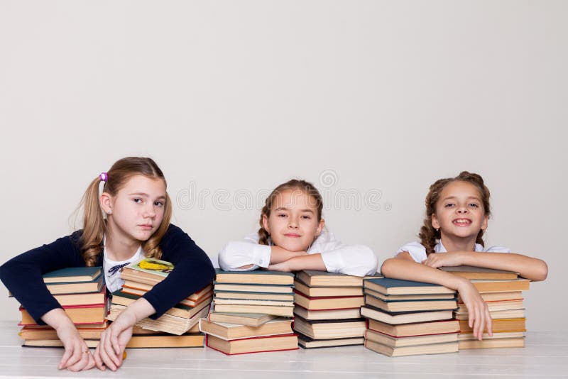 Three Girls in Class at School with a Lot of Books Stock Image - Image ...
