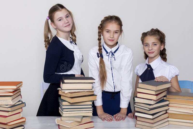Three Schoolgirl Girls Standing at the School Board in Class Stock ...