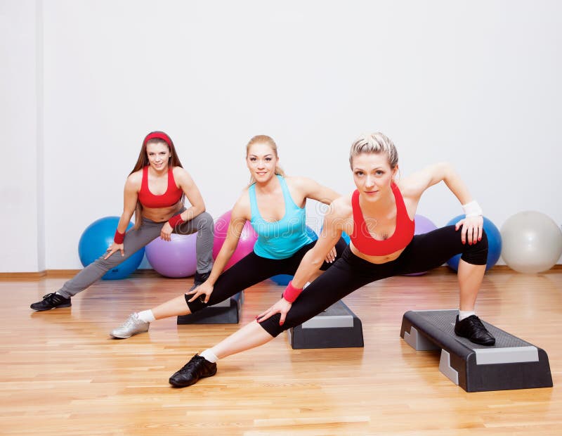 Three girls in fitnes club stock photo. Image of female - 25088088