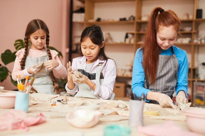 Three Girls in Pottery Workshop Stock Photo - Image of creative, class ...