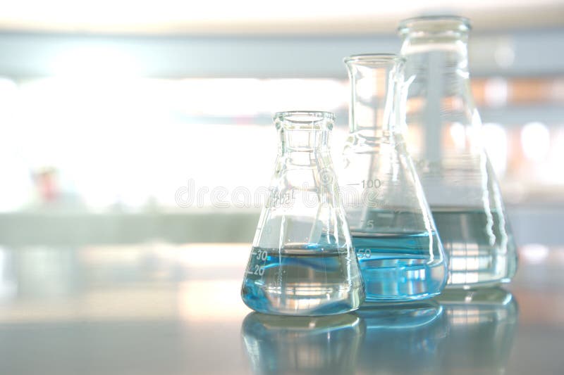 Three Glass Flask in Blue Chemistry Science Laboratory Background Stock ...