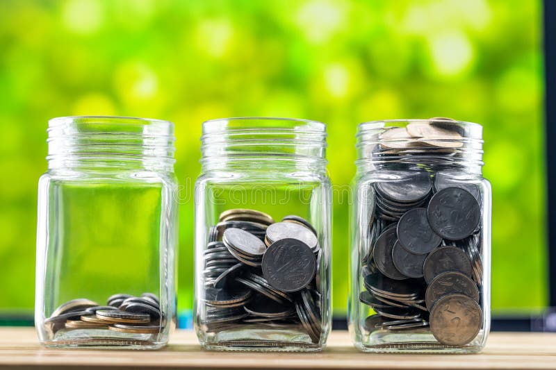 Three Glass Jars Containing Coins - Money-saving Concept Stock Image ...